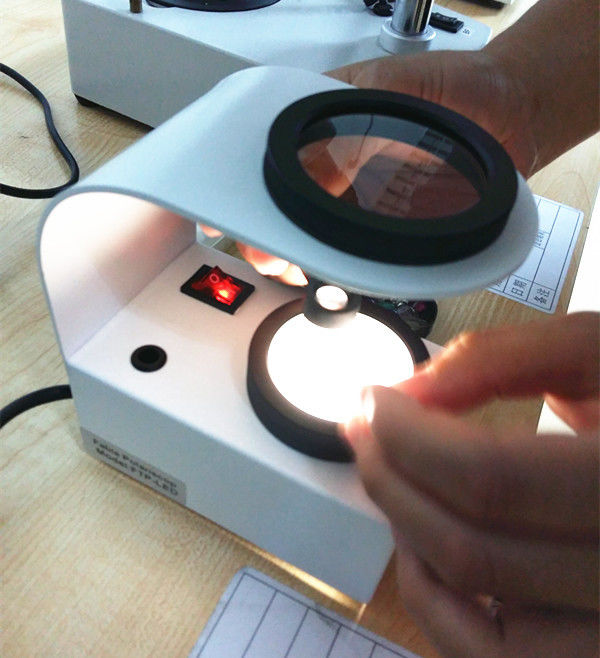 Yellow light of Gemological Polariscope with a Conoscope and Power of ...